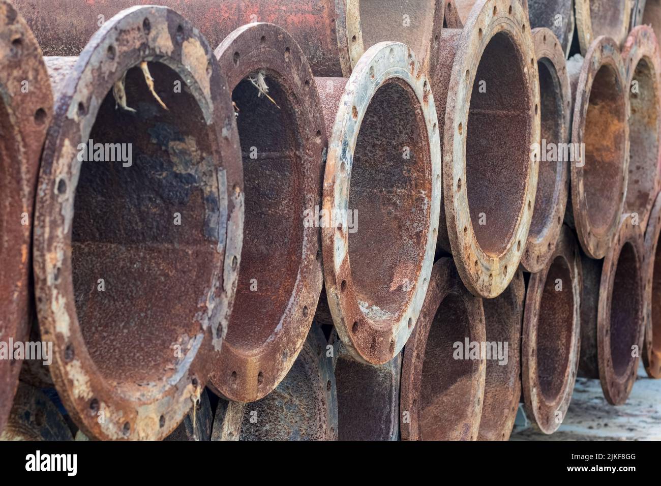 A pile of stored dredging pipes close up with selective focus Stock ...