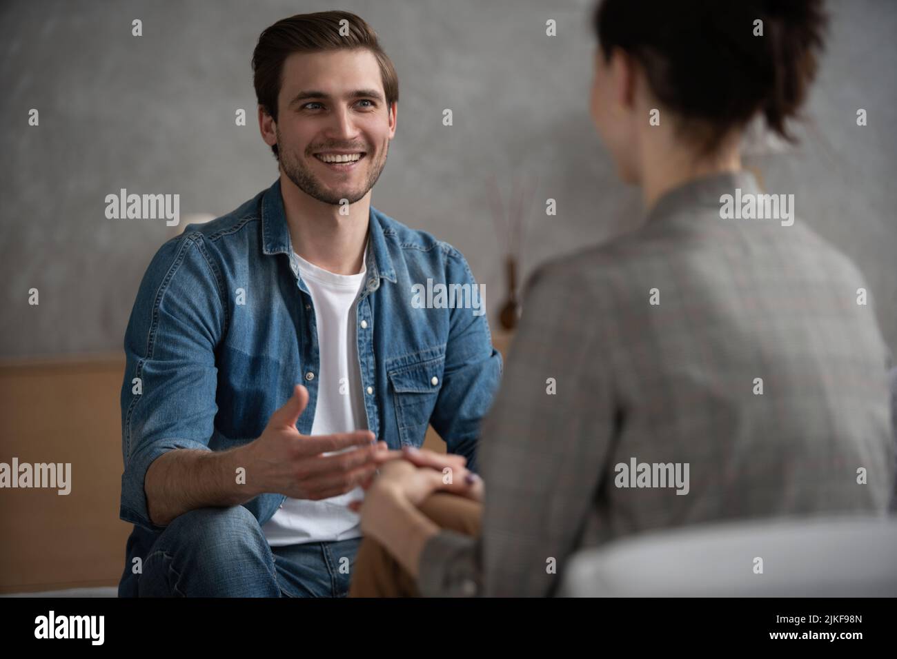 Psychologist talking with patient on therapy session Stock Photo - Alamy