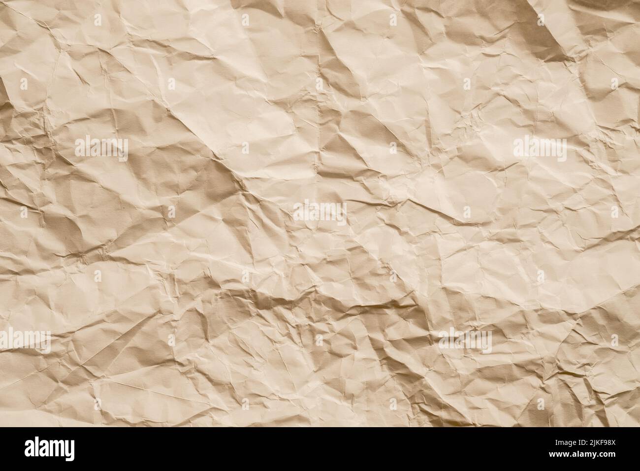 beige crumpled paper wrinkled texture background Stock Photo - Alamy