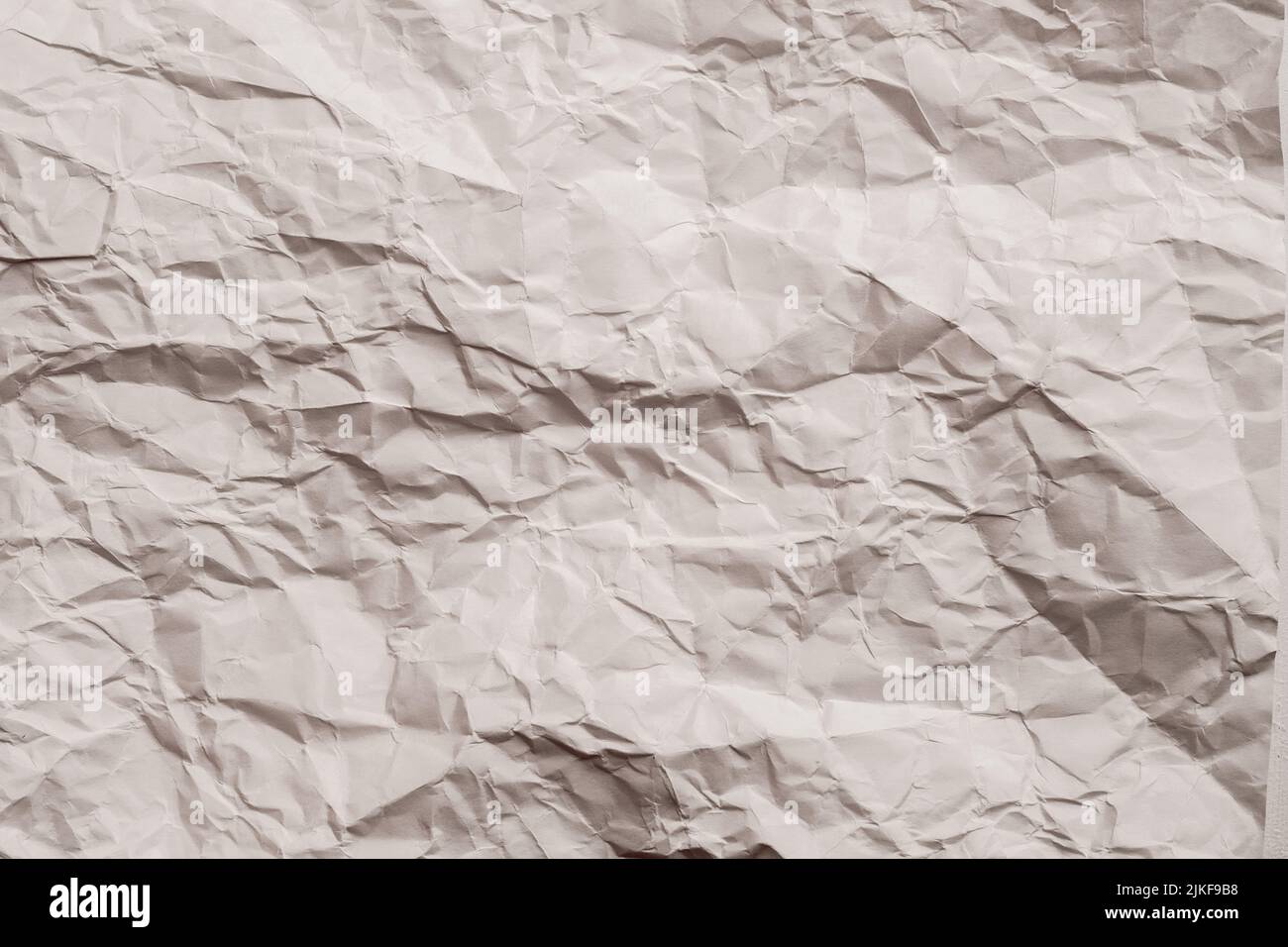 brown wrinkled paper sheet eco friendly background Stock Photo - Alamy