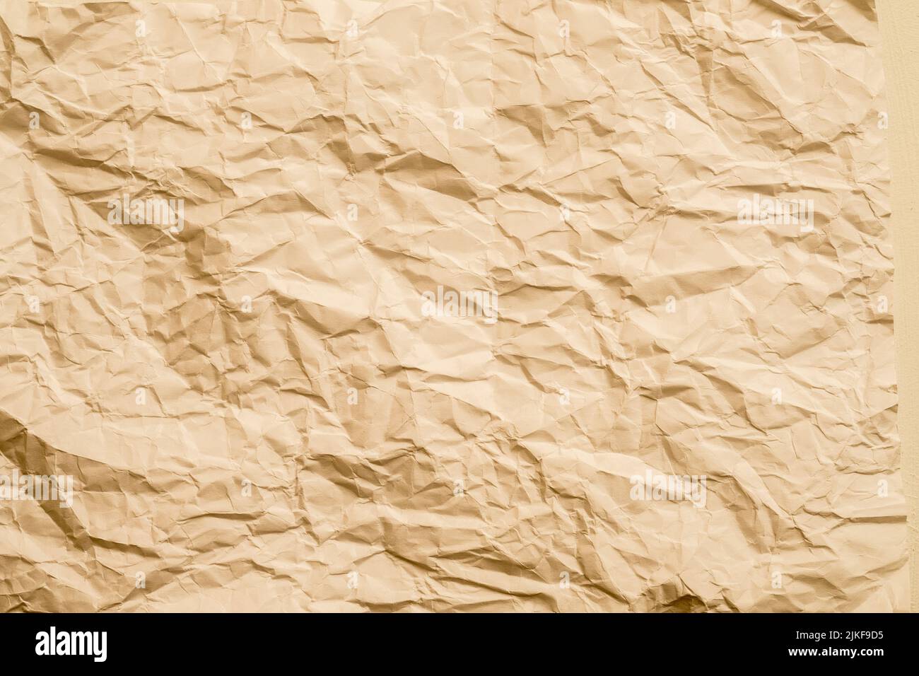 beige wrinkled paper crushed texture background Stock Photo - Alamy