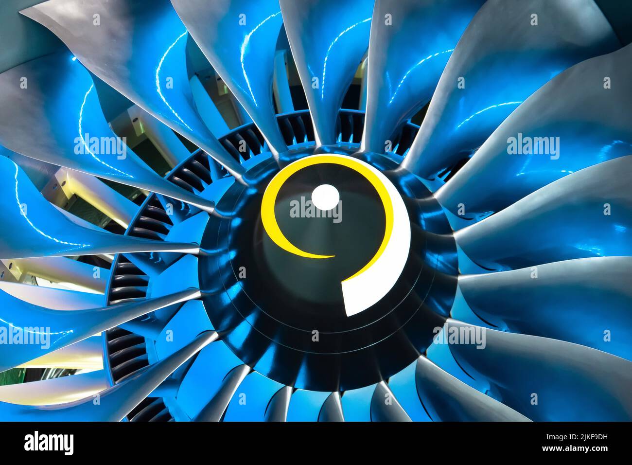 Turbo jet engine blades of the aircraft, close up in the blue light ...