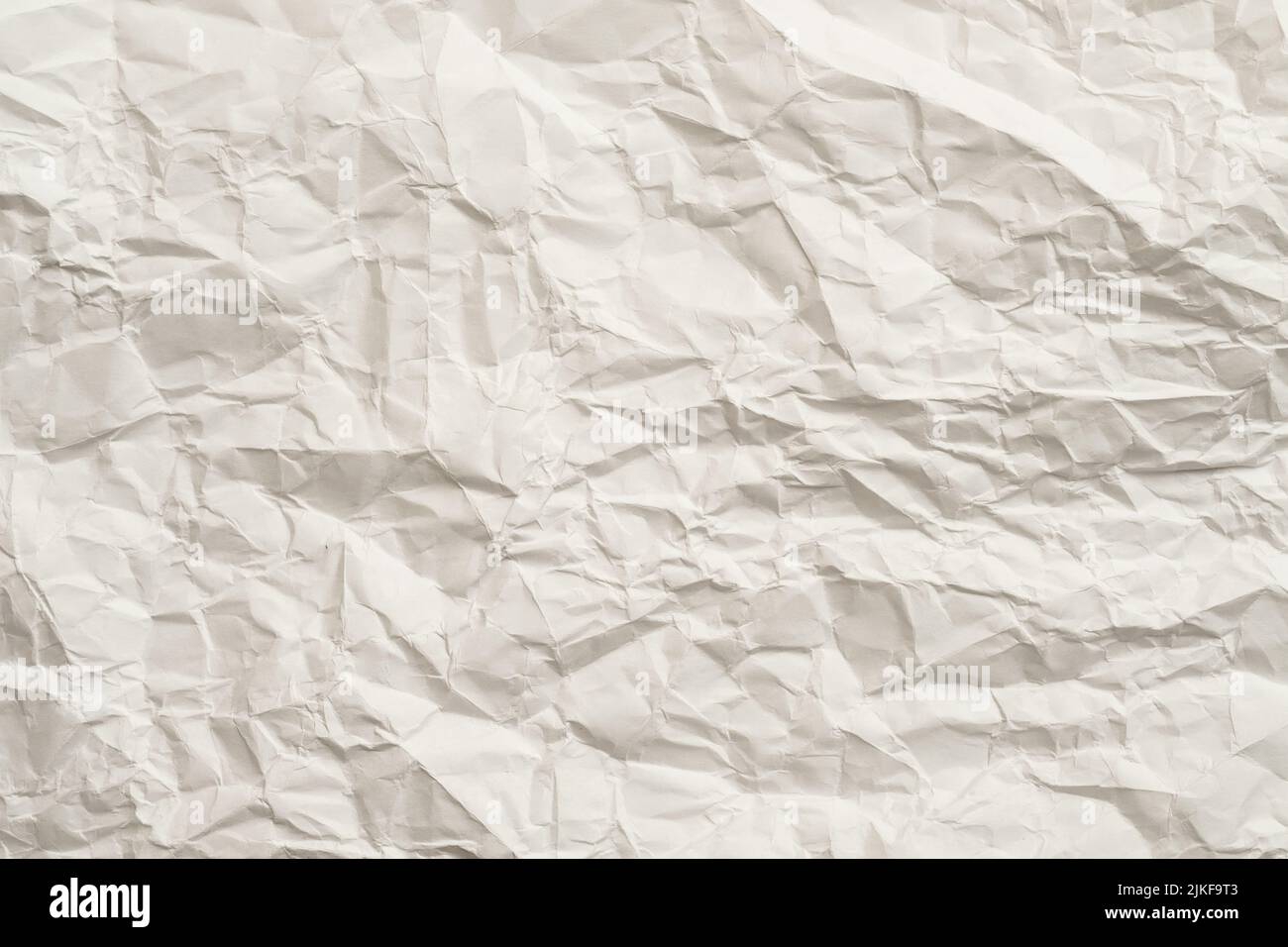ivory crumpled paper waste recycling background Stock Photo - Alamy