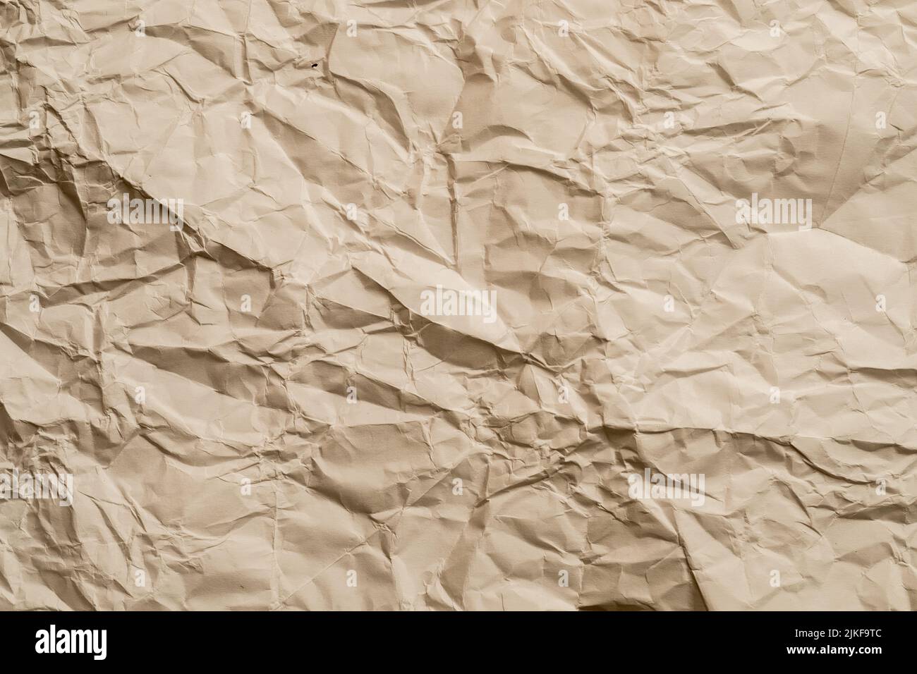 beige wrinkled paper creased texture background Stock Photo - Alamy
