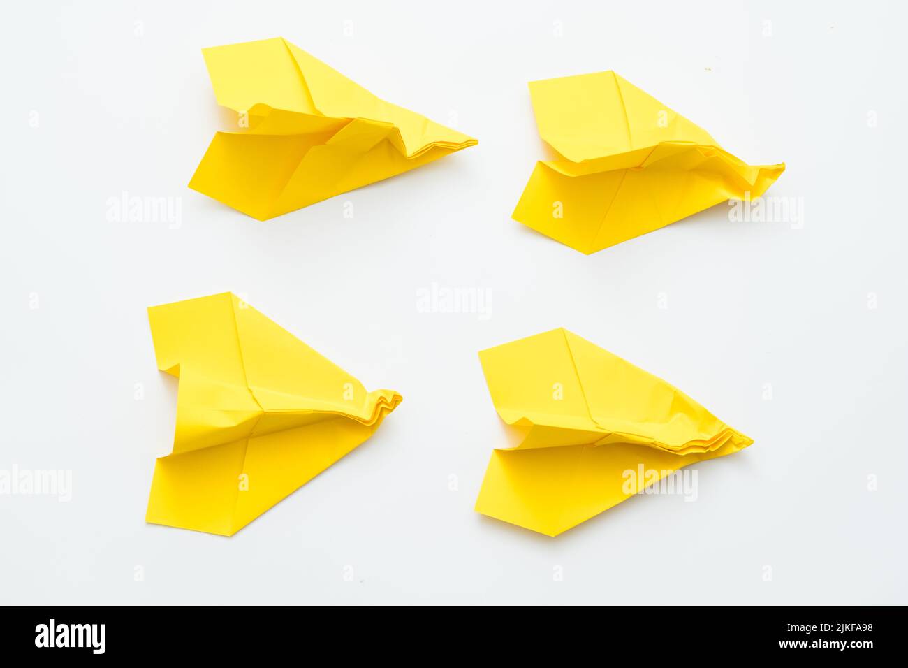 experience failure yellow wrinkled paper airplanes Stock Photo - Alamy
