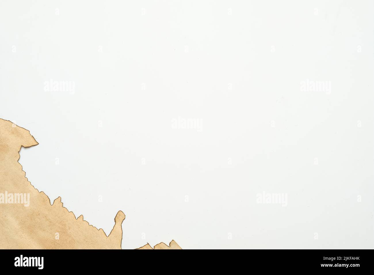 old stained beige paper burnt white background Stock Photo - Alamy