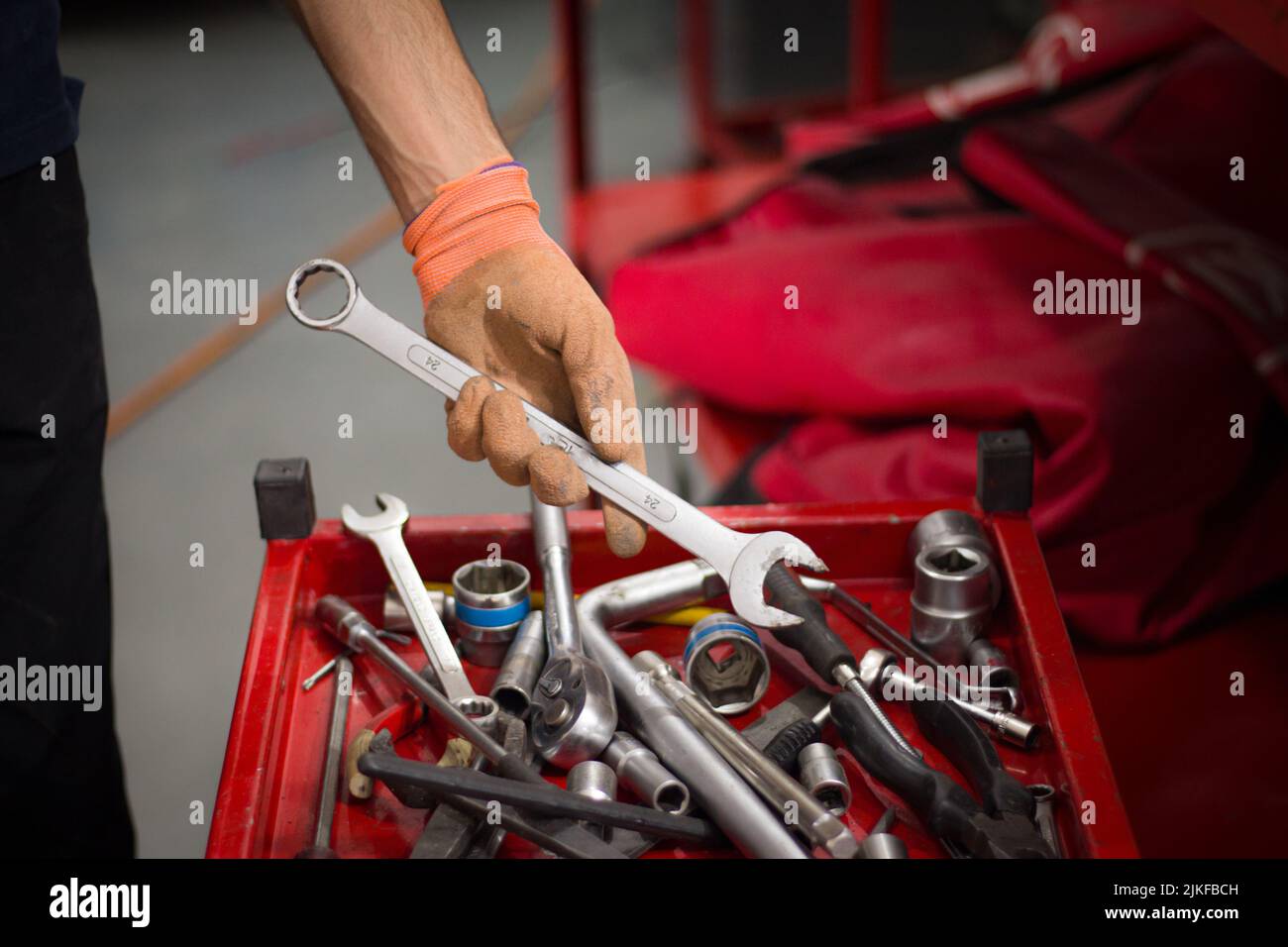 Pakistani or Indian or South Asian Car Mechanic picking wrench or key ...