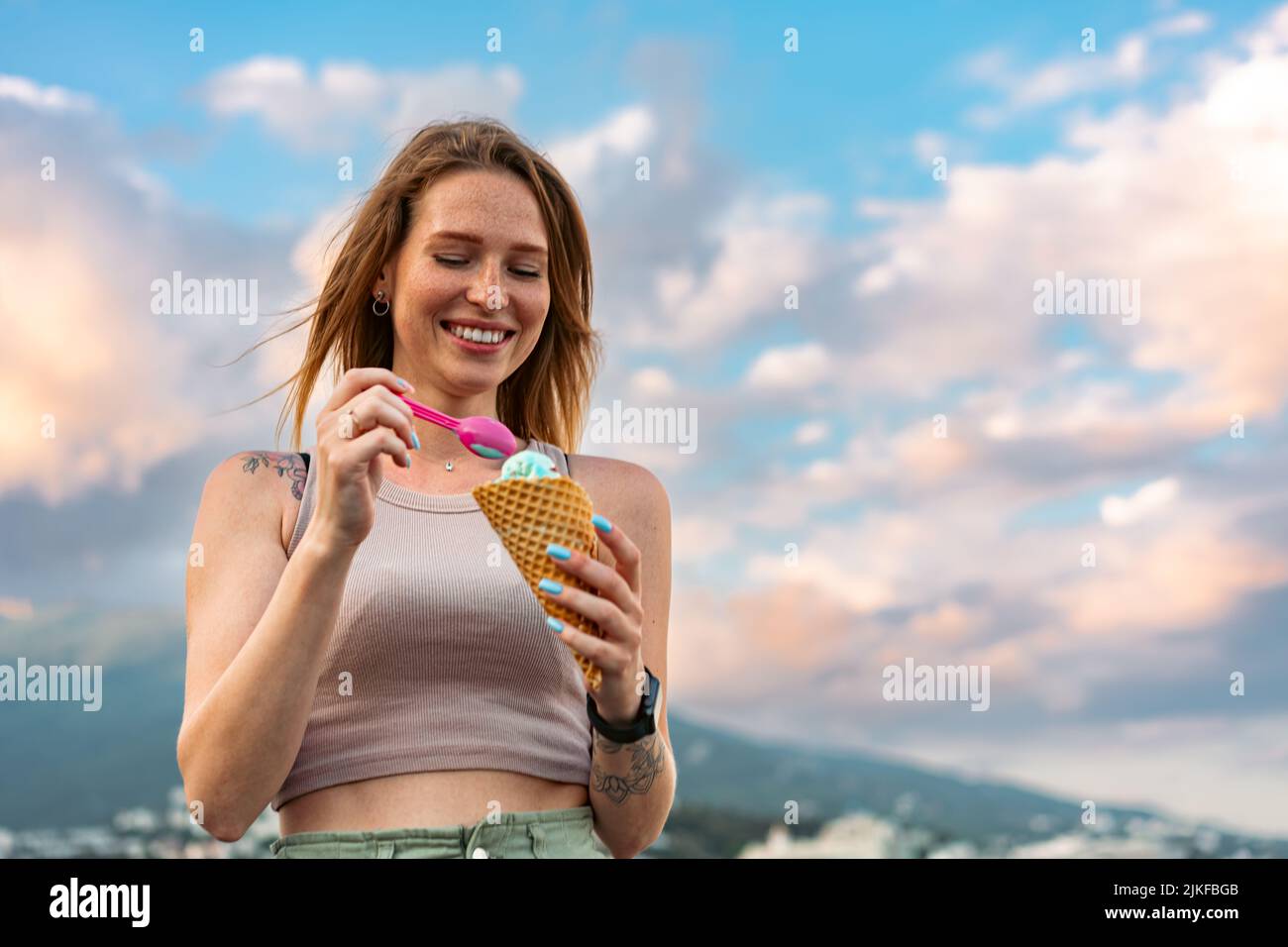 To people walking eating icecream hi-res stock photography and images ...