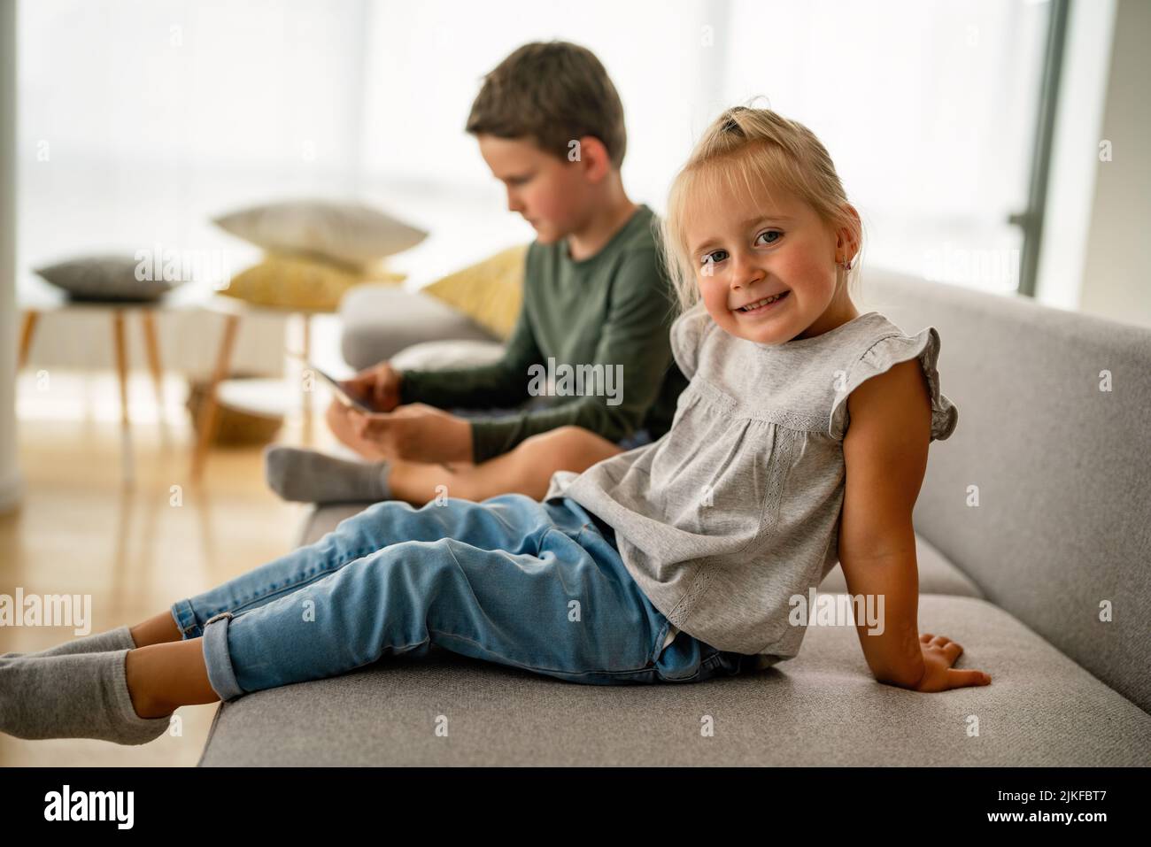 Portrait of happy little girl smiling and having fun at home Stock ...