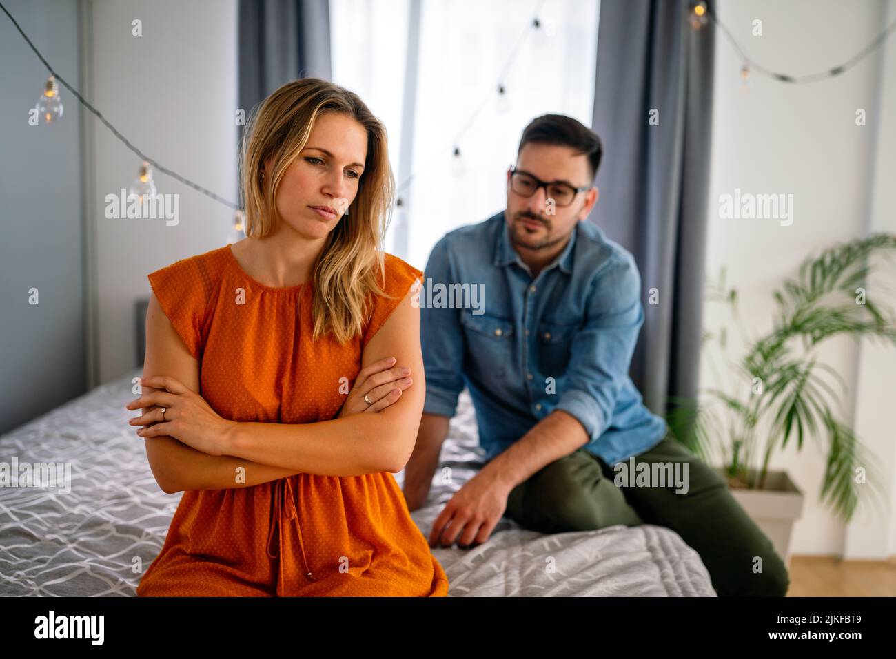 Frustrated young couple arguing and having marriage problems. Divorce ...