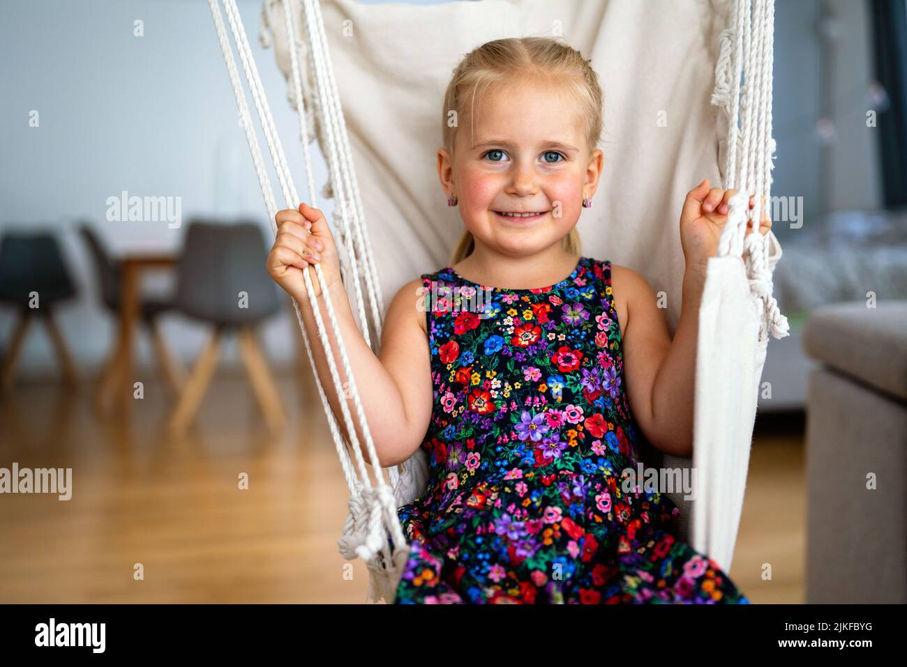 Portrait of happy little girl smiling and having fun at home Stock ...