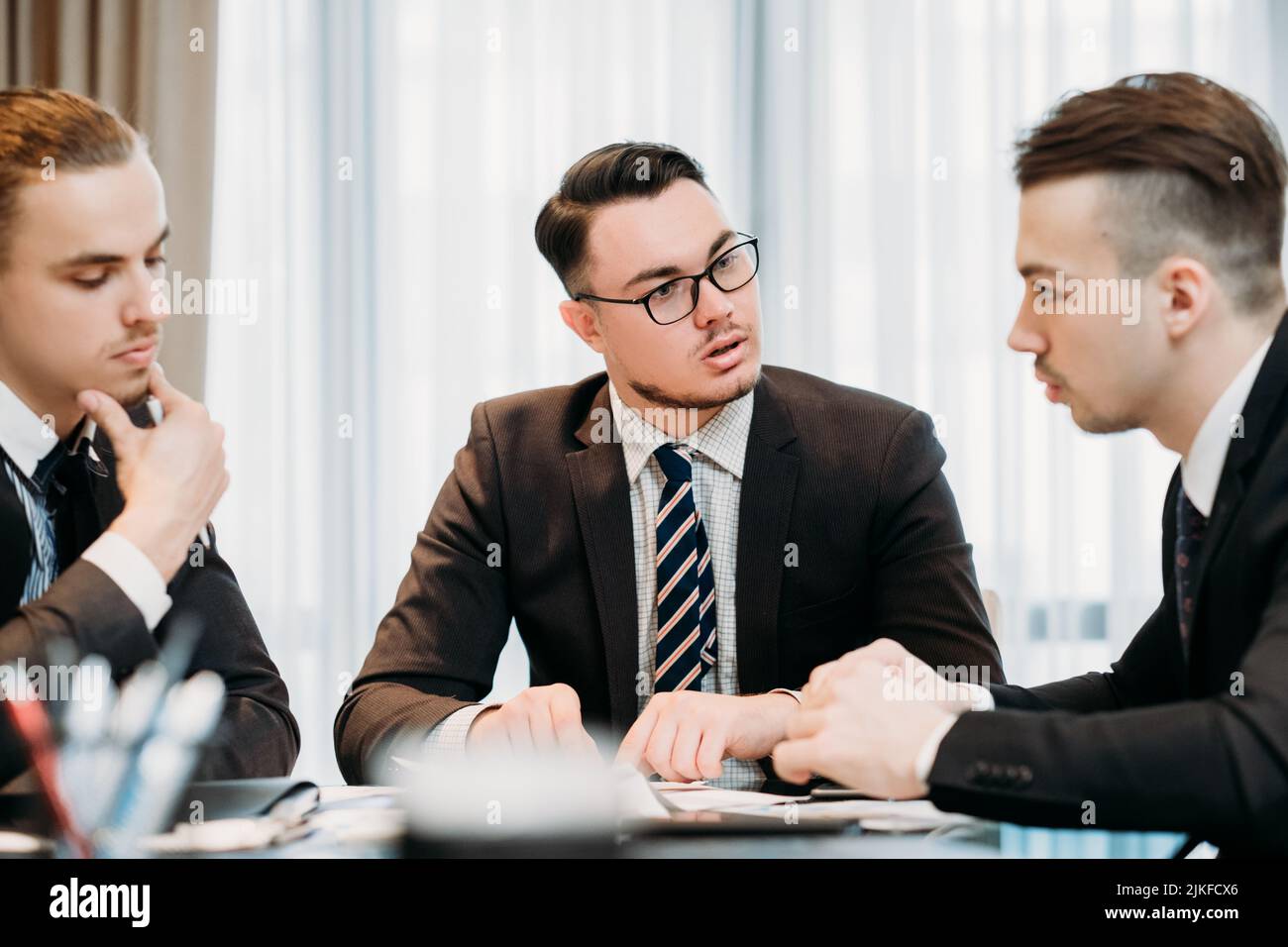marketing meeting business corporate men discuss Stock Photo - Alamy