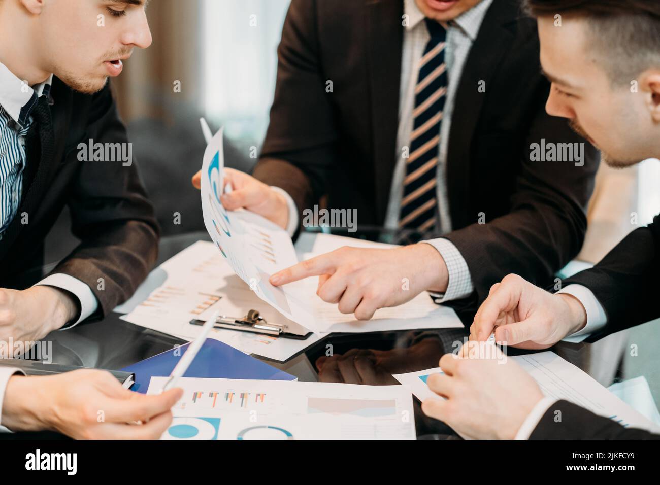 business document data statistics paper discussion Stock Photo - Alamy