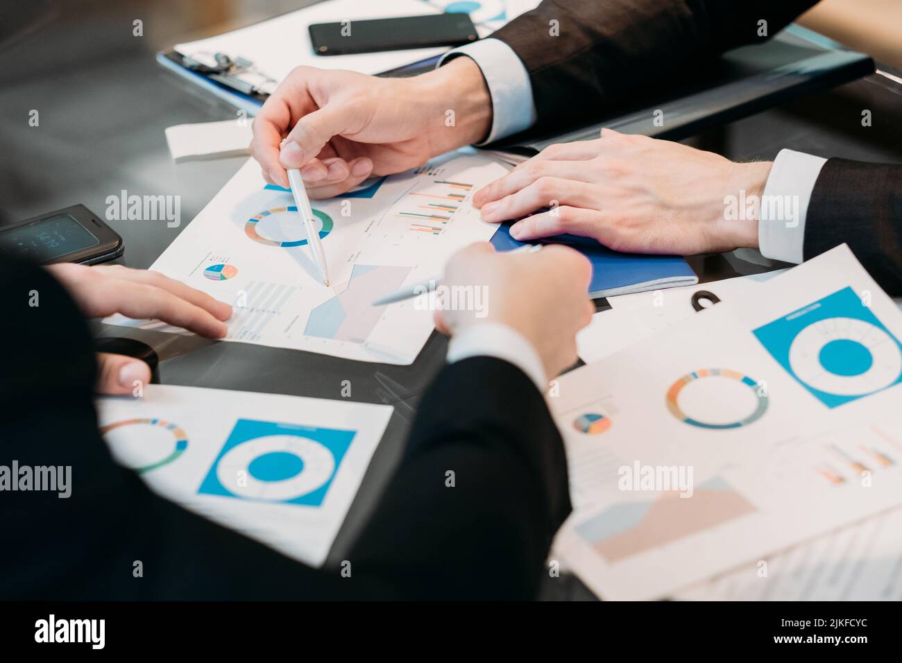 meeting business team brainstorm document info Stock Photo - Alamy
