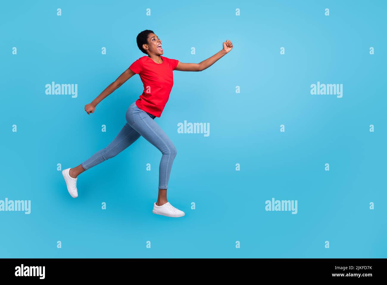 Full size photo of sportive energetic person jump rush look empty space ...