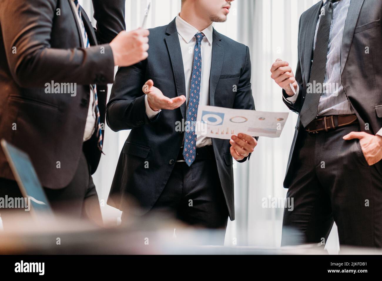 Men talking business meeting hi-res stock photography and images - Alamy