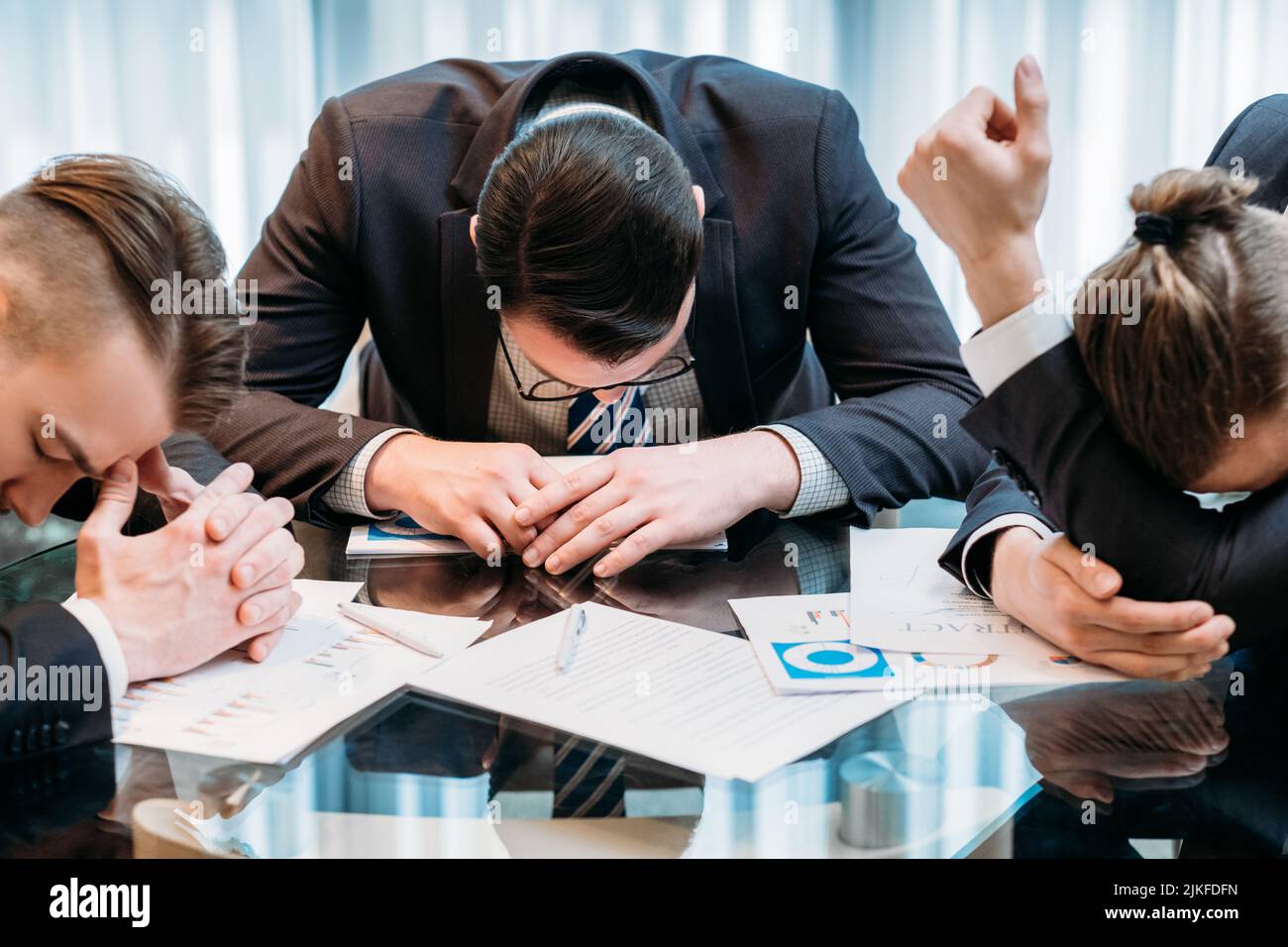 business problems stressed defeated team document Stock Photo - Alamy
