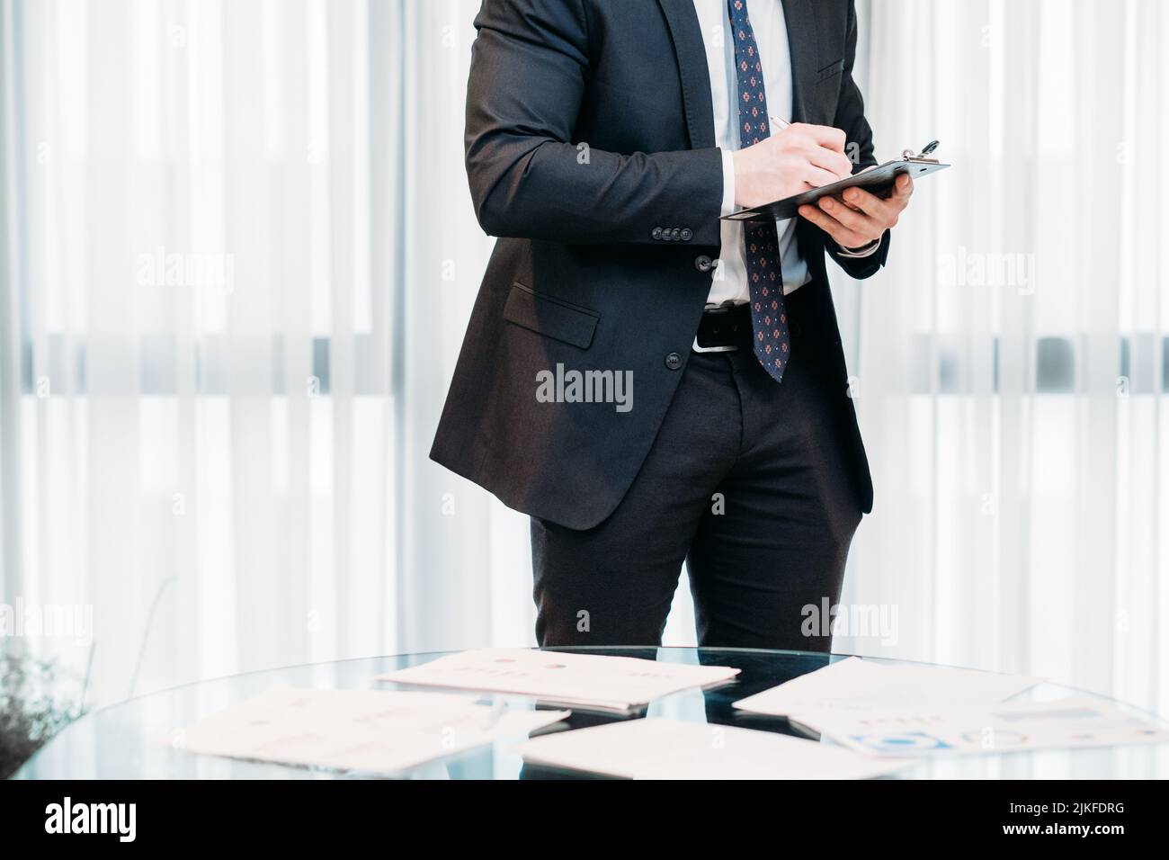 business man write idea list planning paper Stock Photo - Alamy