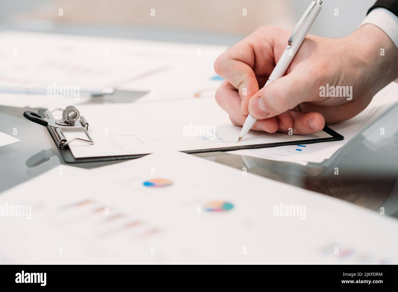 male hand write idea list business planning paper Stock Photo - Alamy