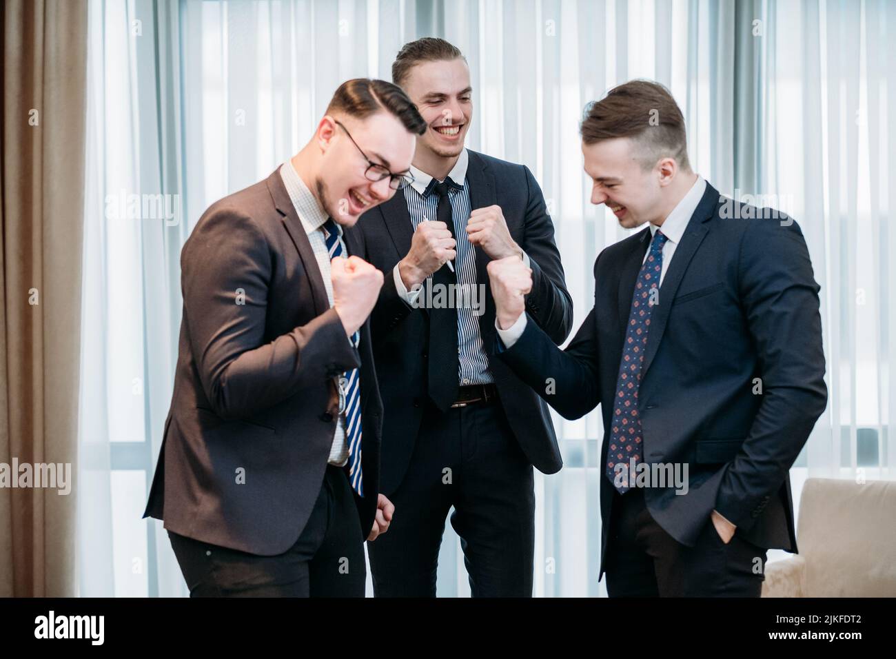 Business people celebrate success hi-res stock photography and images ...