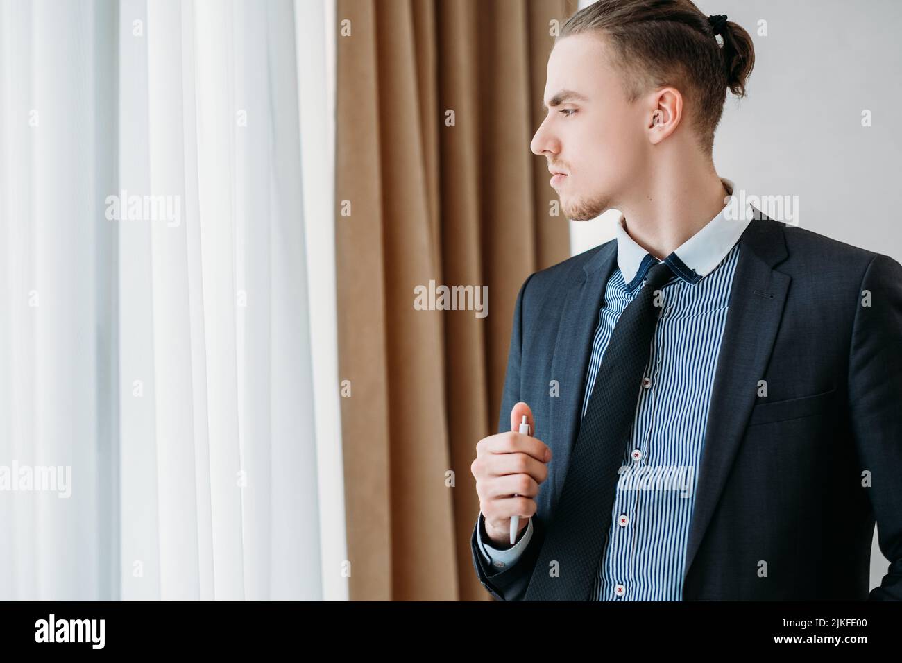 pensive business man look window career lifestyle Stock Photo - Alamy