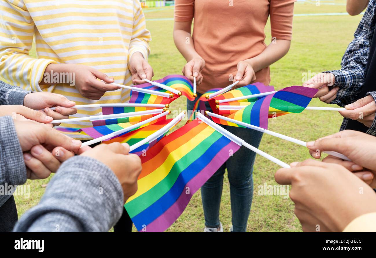 LGBTQ Rainbow Flags being waved symbol of Diversity Gay and lesbian for ...