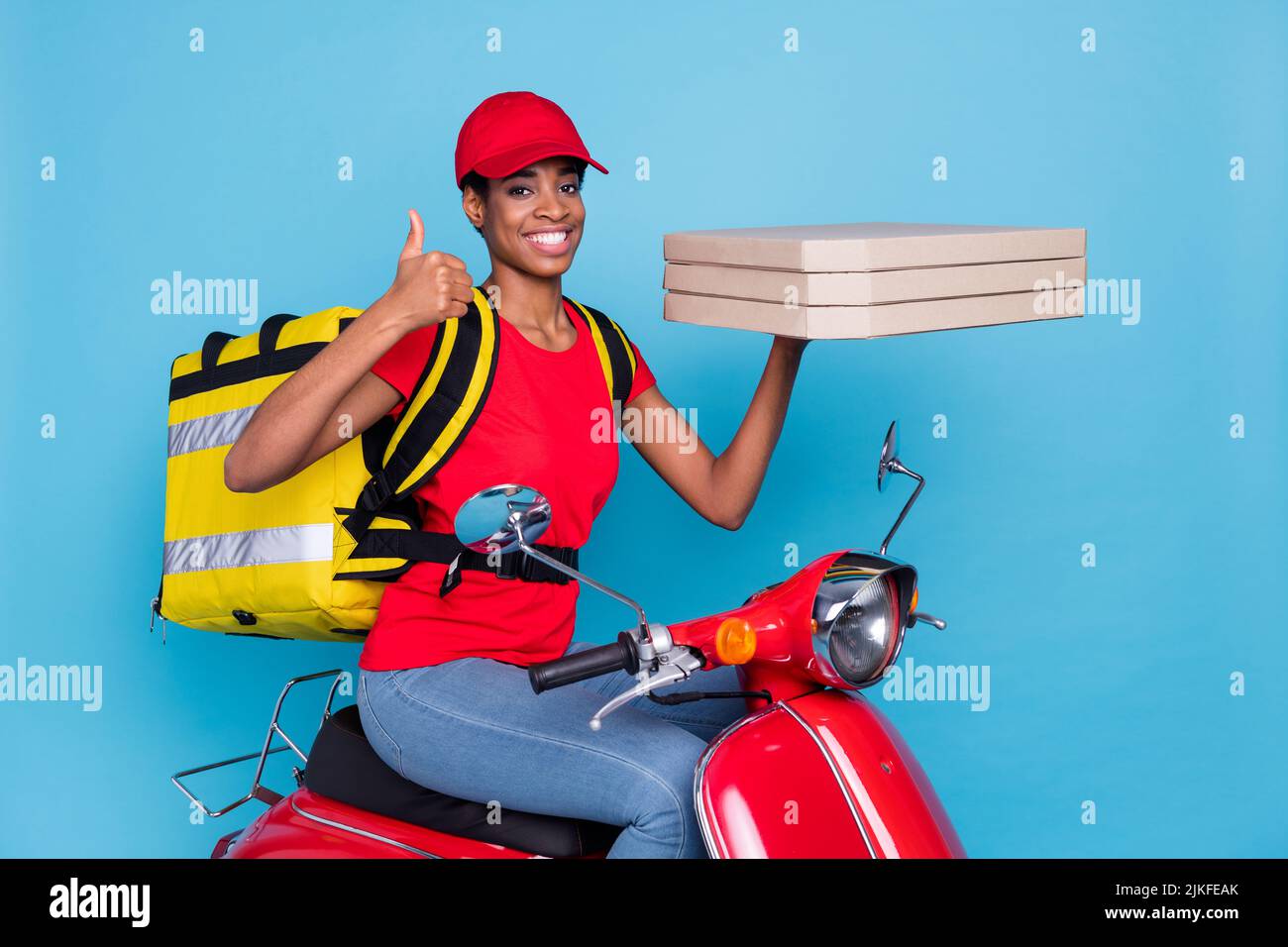 Photo of sweet cute short hair person dressed red uniform moto rider ...