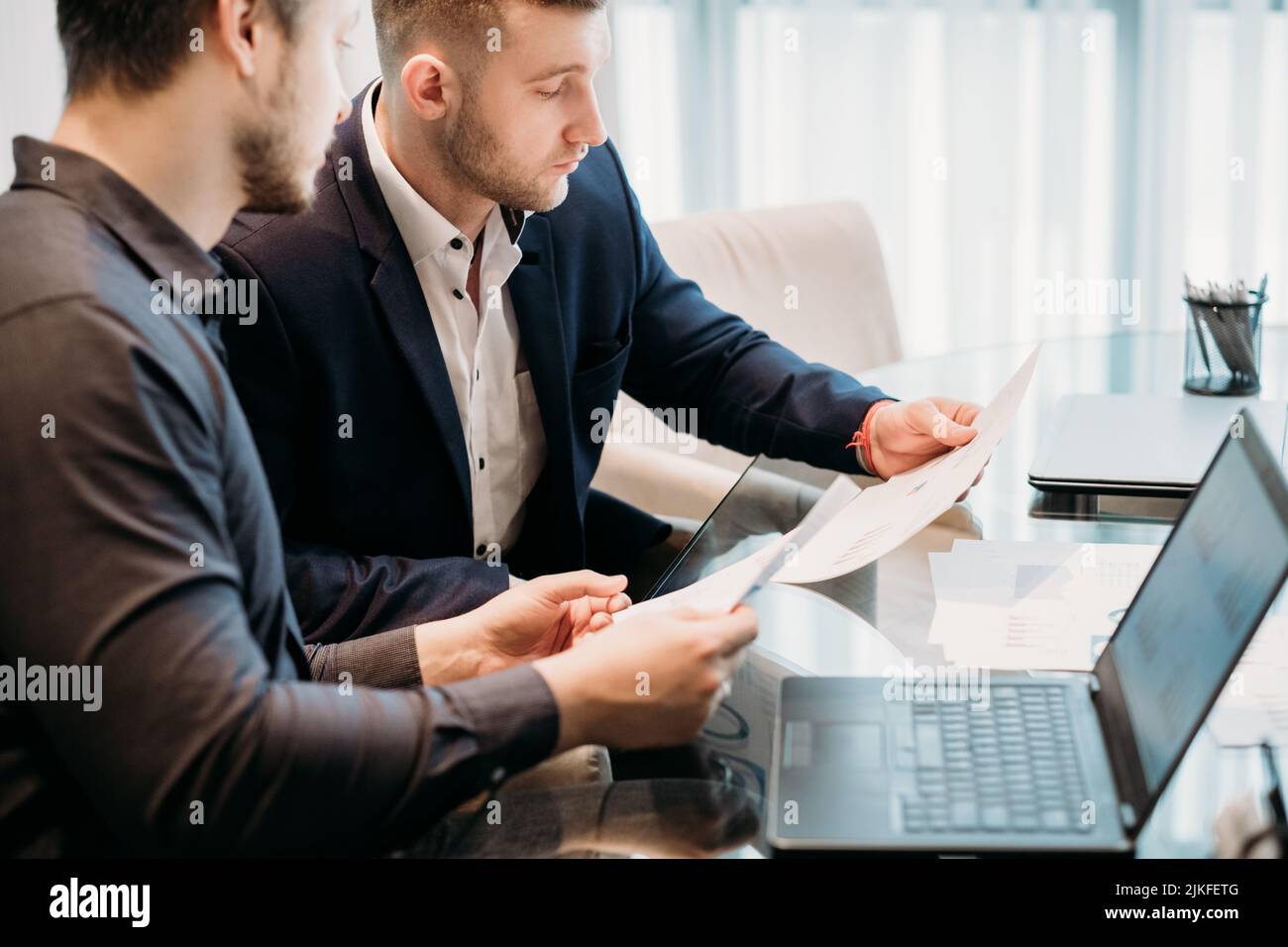 Business team work laptop documents hi-res stock photography and images ...