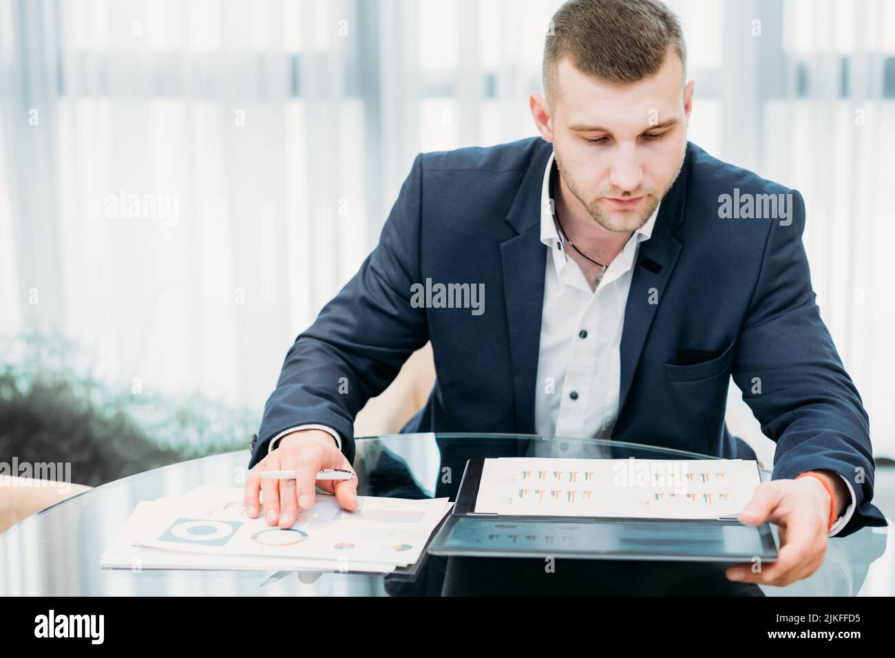 successful business man working office papers Stock Photo - Alamy