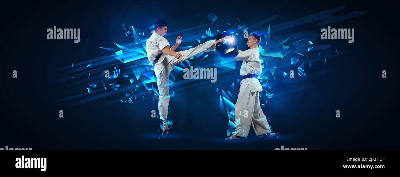 Flyer with fight of two karatedo fighters in kimono training over dark ...