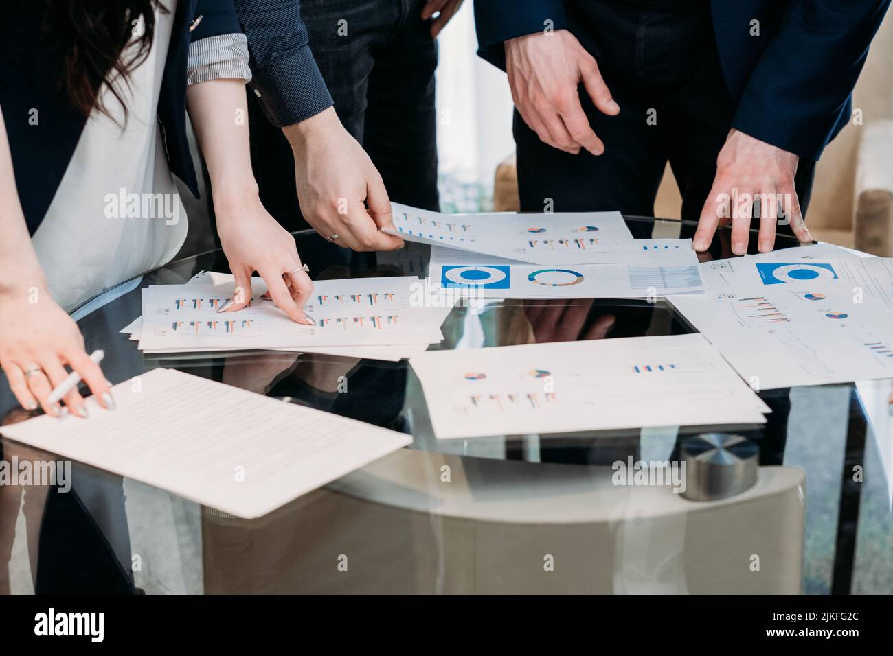 business team graph data report papers information Stock Photo - Alamy
