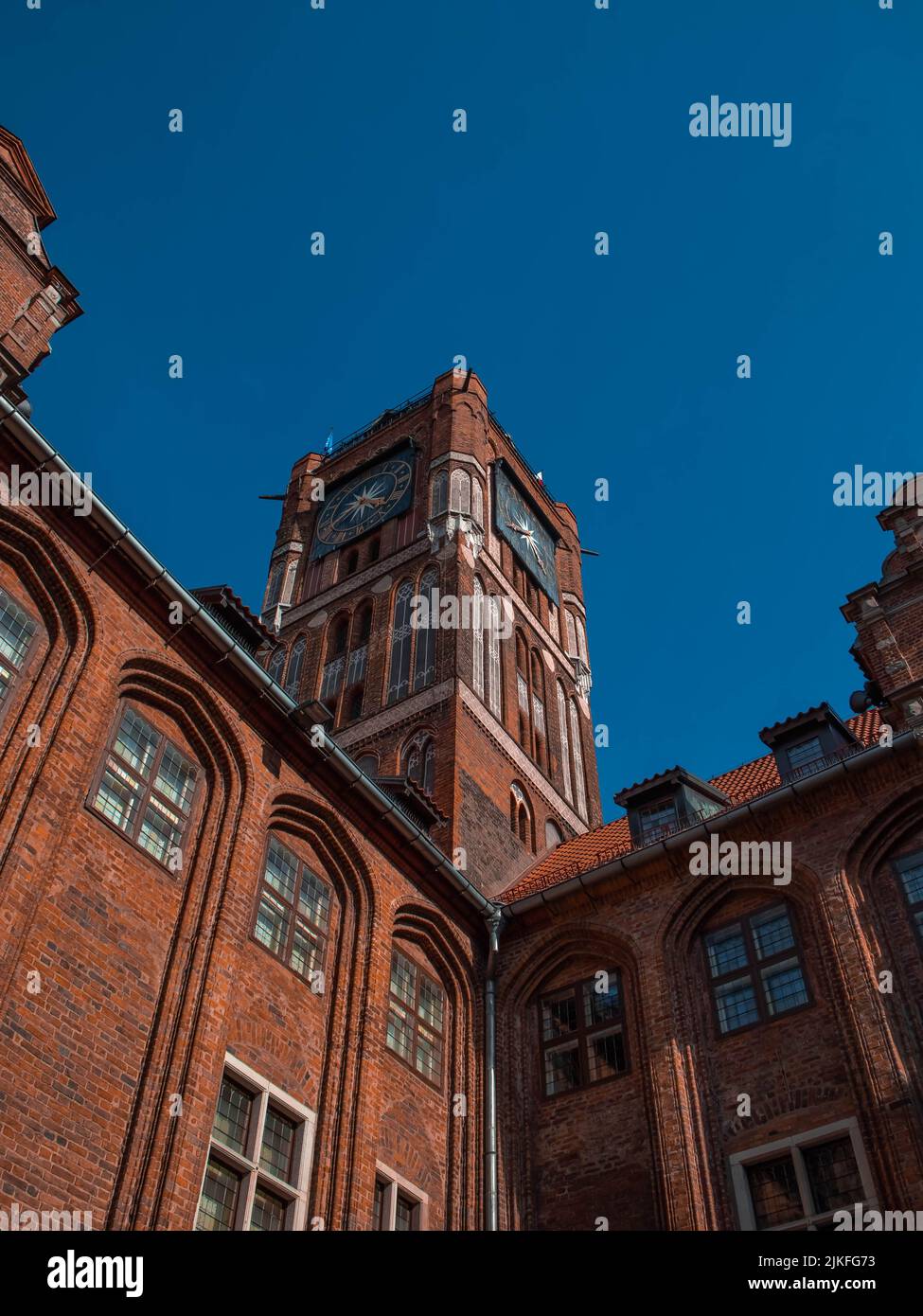 A vertical low angle shot of the Red City Hall (Rotes Rathaus) in ...