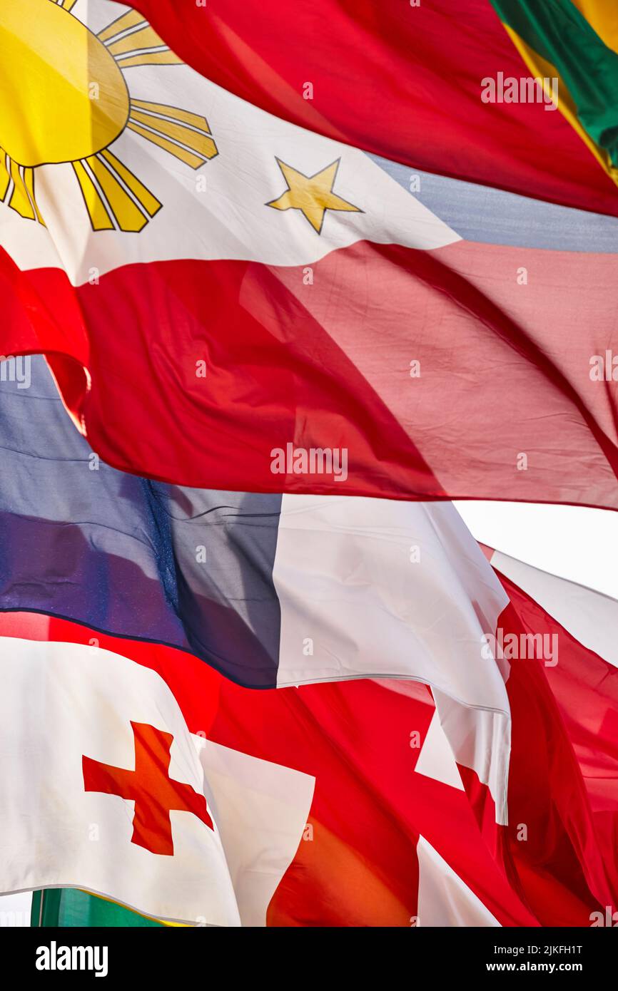 Flags of the word waving in the wind. Nation emblems Stock Photo - Alamy