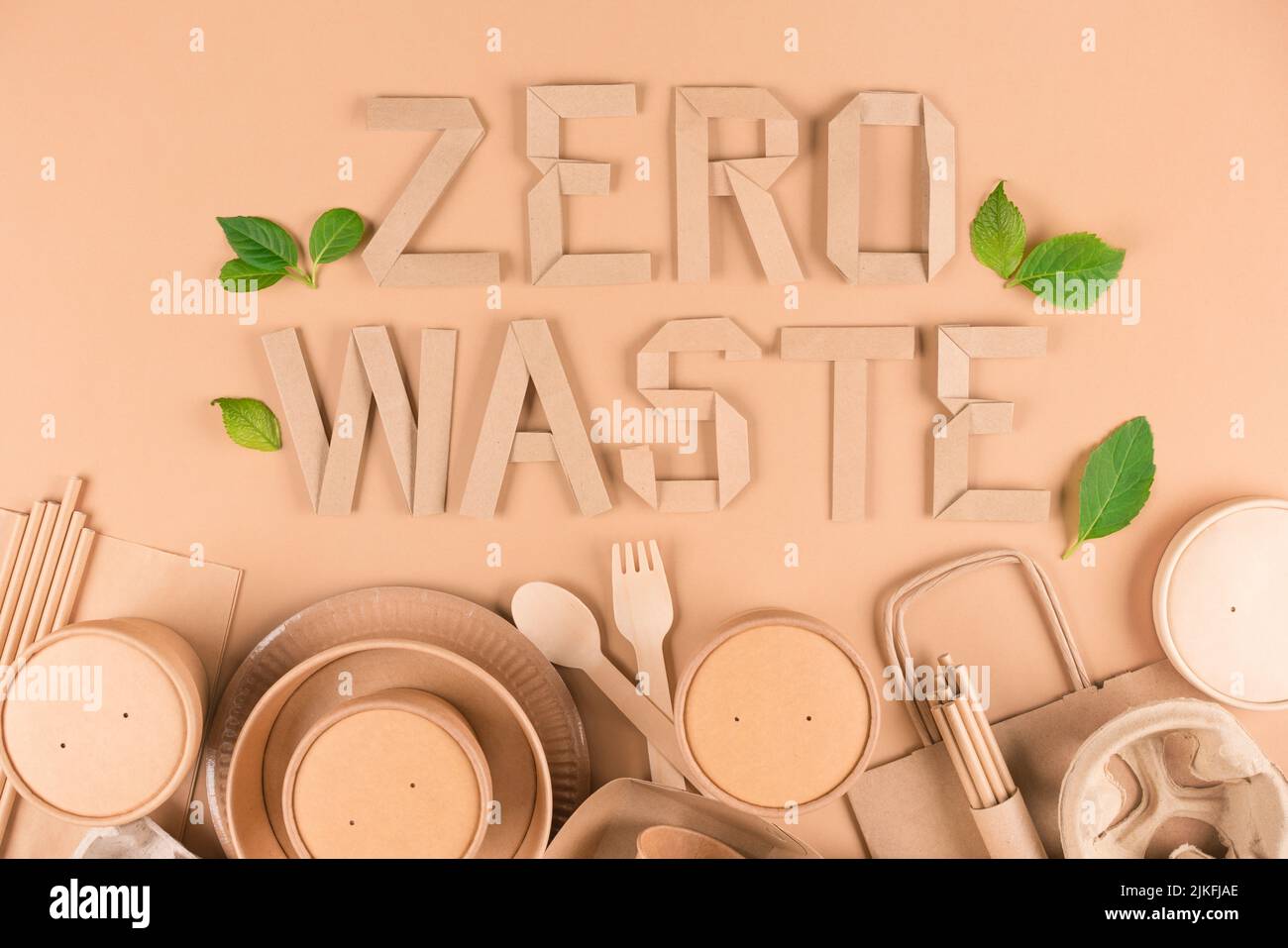 Eco food packaging concept, zero waste paper utensils over light brown ...