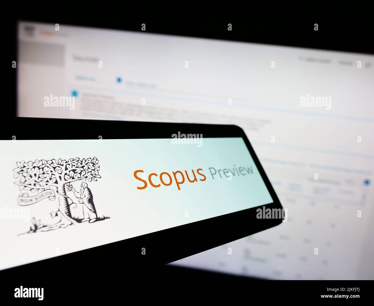Mobile phone with logo of citation database Scopus Preview on screen in ...