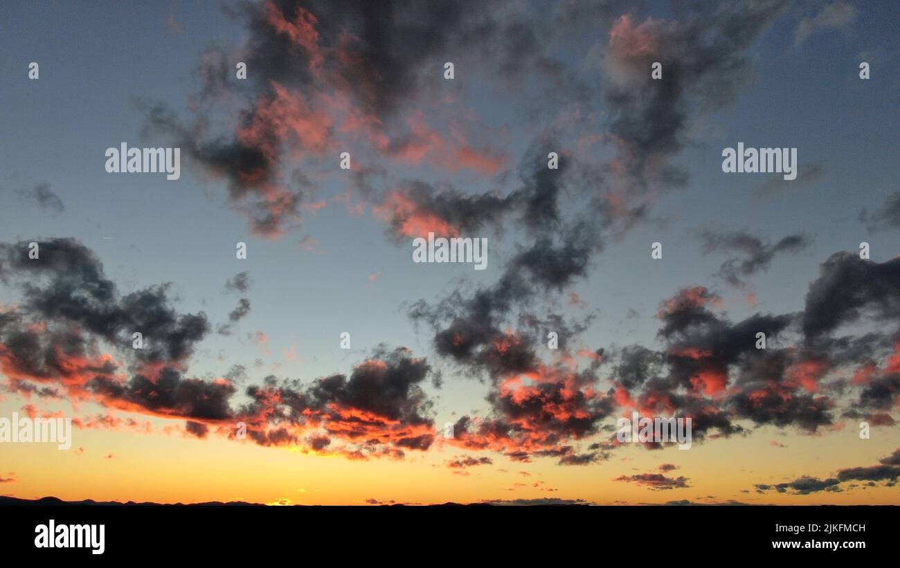 Red Sunset on the Clouds In the Wild Stock Photo - Alamy