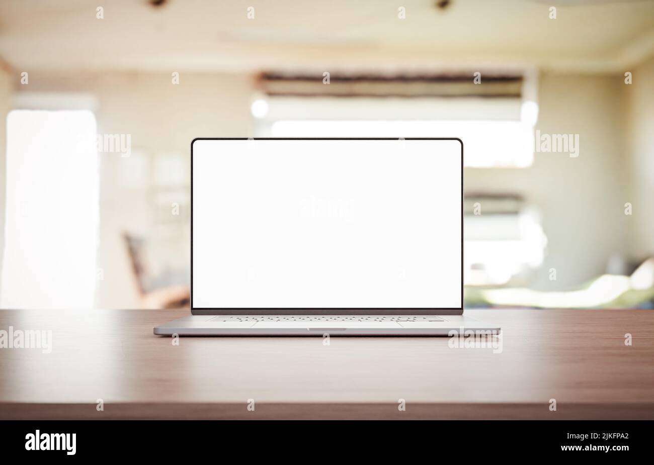 Laptop with a blank frameless screen on the table - 3d render Stock ...