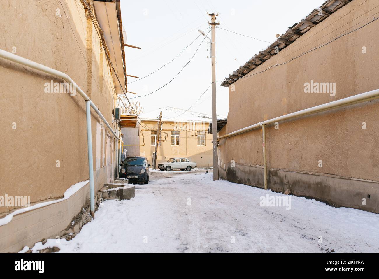 Tashkent, Uzbekistan. December 2020. Houses and cars waved Old Town in ...