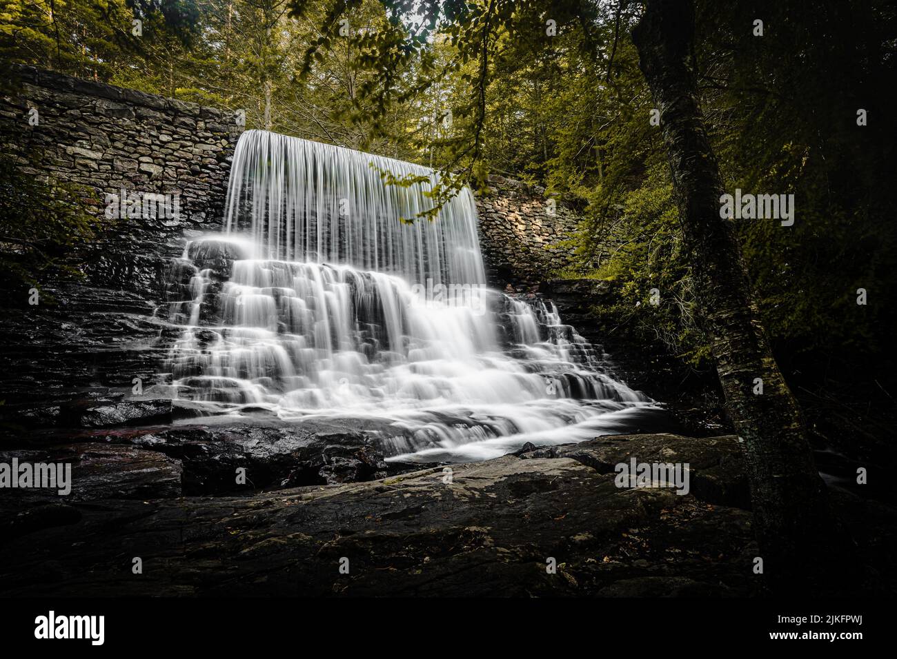 A breathtaking view of a waterfall over the Stametz Dam in Pennsylvania Stock Photo - Alamy