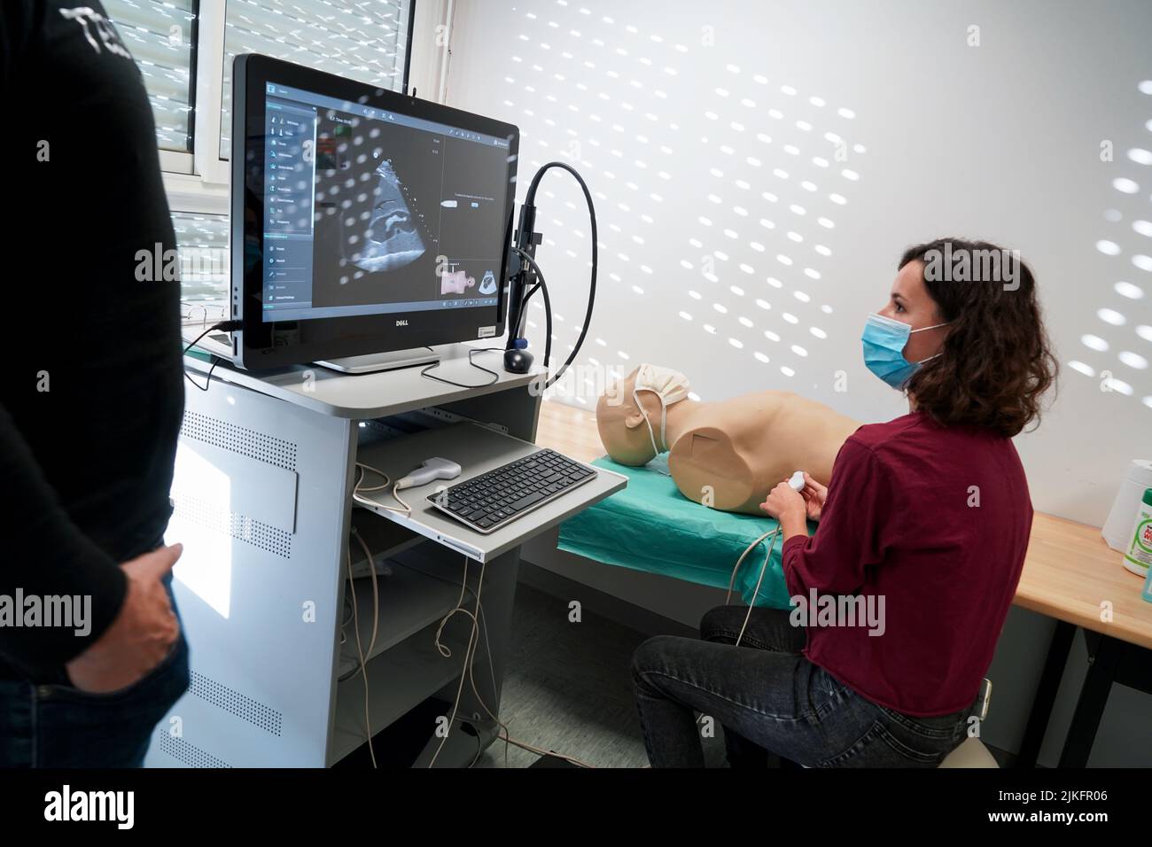 Students and their teacher during an echography simulation workshop on ...