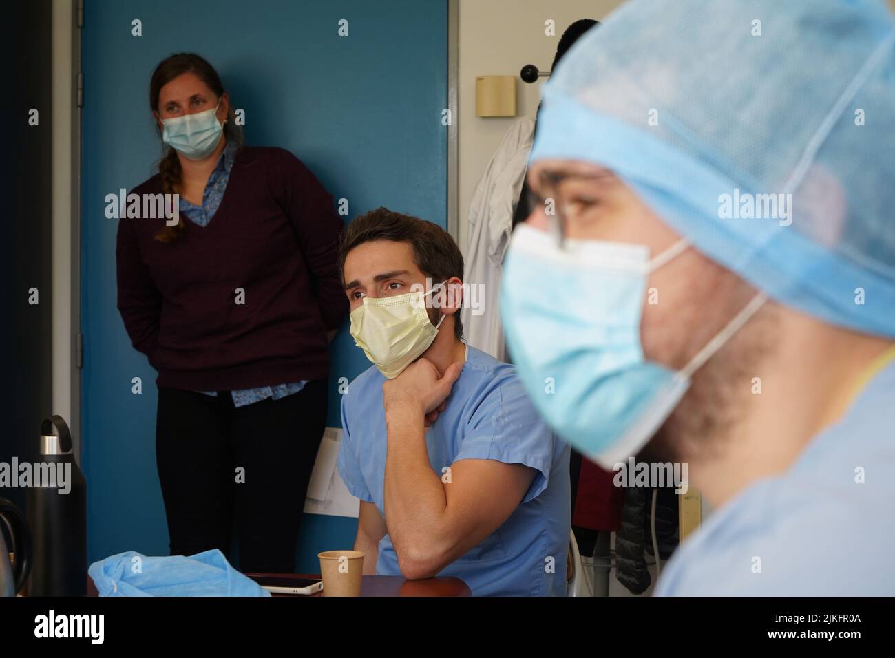 Students during a debriefing session after a resuscitation simulation ...