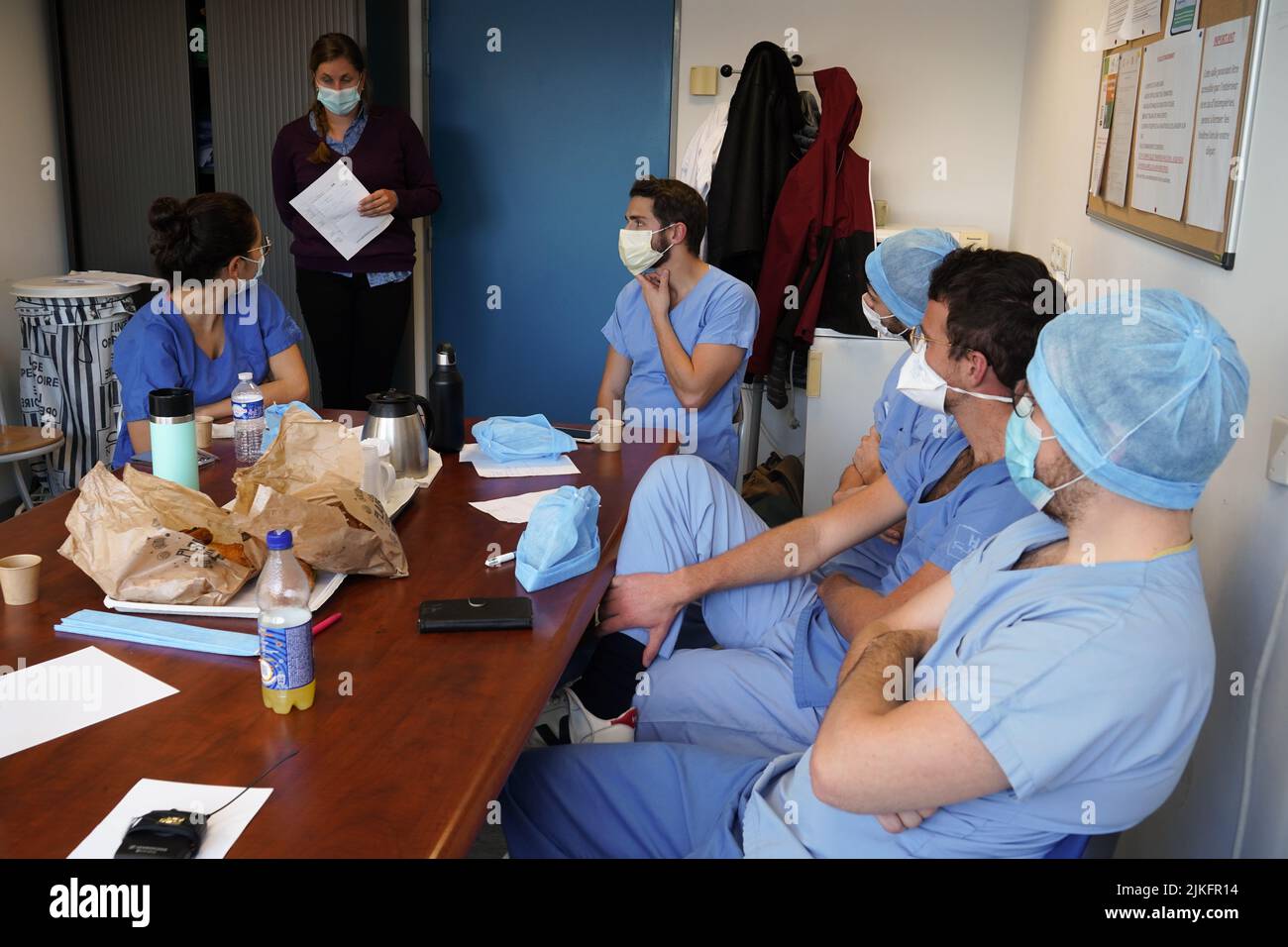 Students during a debriefing session after a resuscitation simulation ...