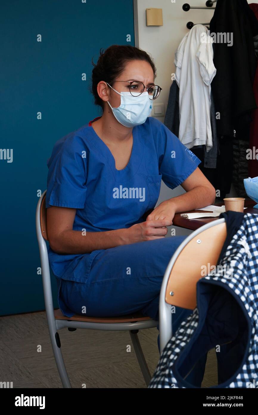 Students during a debriefing session after a resuscitation simulation ...