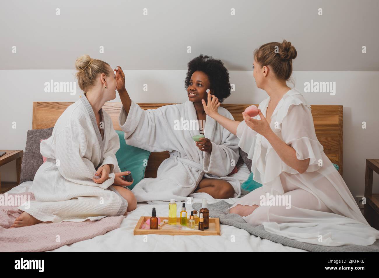 The young women are having a spa party Stock Photo - Alamy