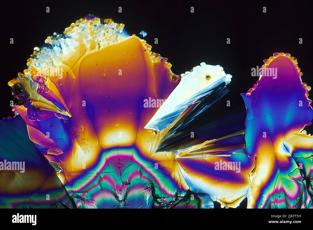 Polarized crystals (photographed under a microscope) of the drug 2-3 ...