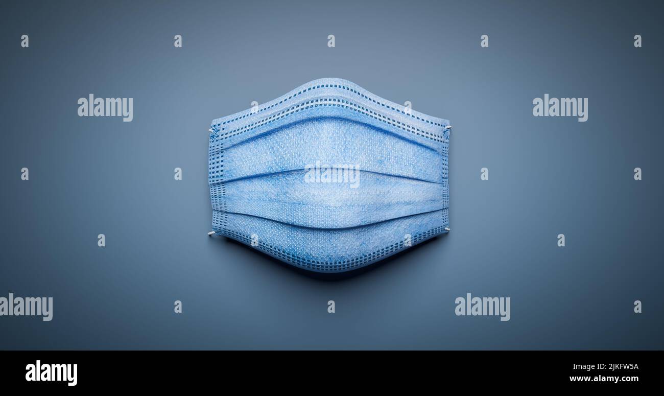 Disposable Face Mask with adjustable nose clip on blue background ...