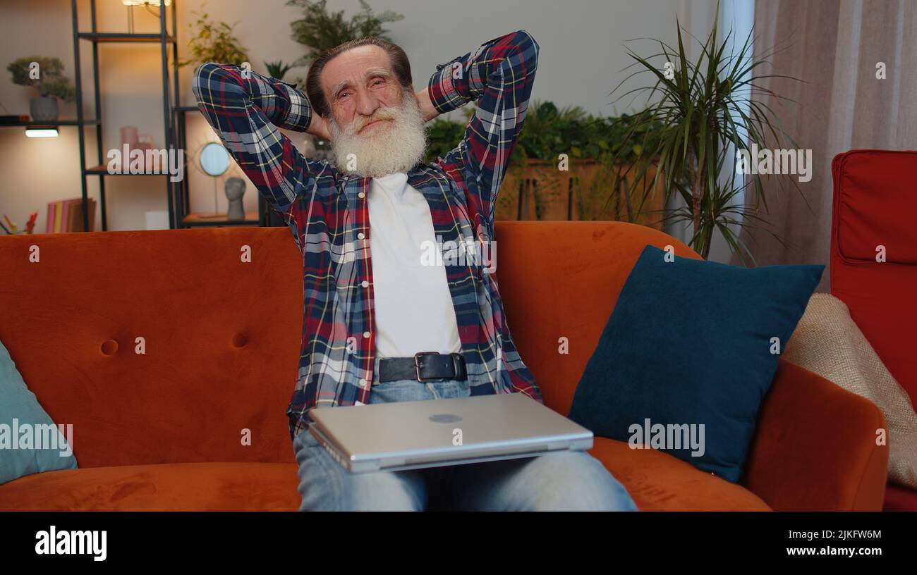 Senior old man closing laptop hi-res stock photography and images - Alamy