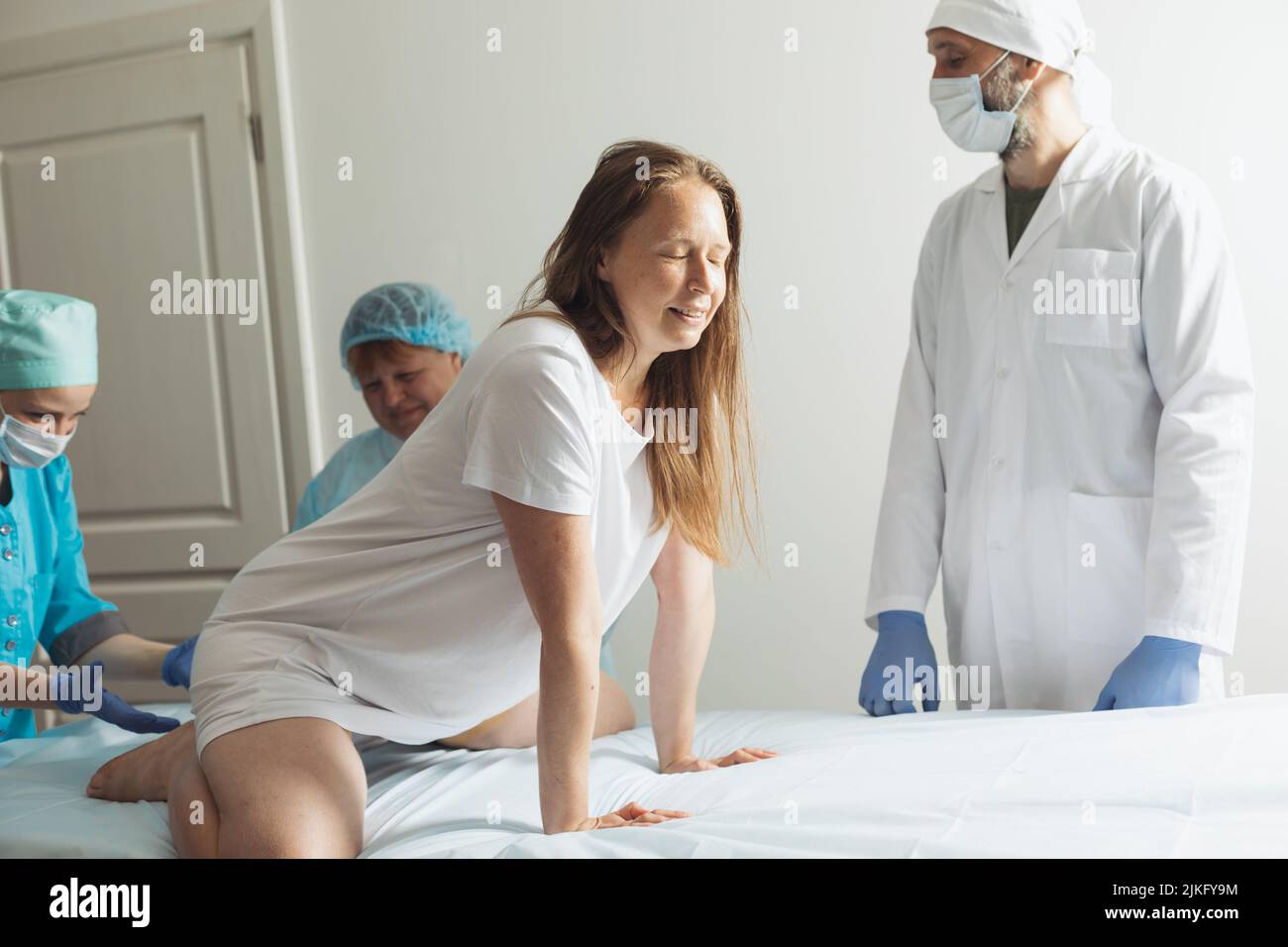 Child birth process, helping personal during labour Stock Photo - Alamy Child birth process, helping personal during labour Stock Photo - Alamy