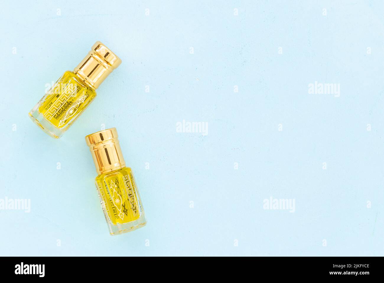 Glass bottles of perfume essential oil. Top view Stock Photo - Alamy
