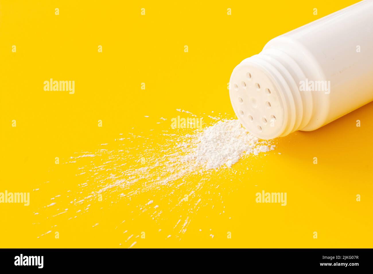 Spilled baby talcum powder in container. Kids skin care cosmetic Stock ...